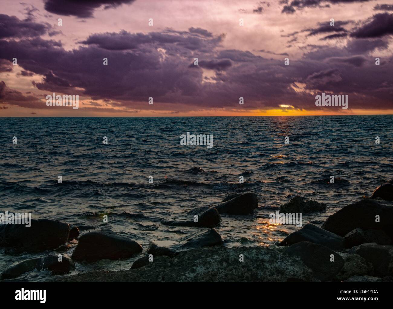 Sunset under the clouds hi-res stock photography and images - Alamy