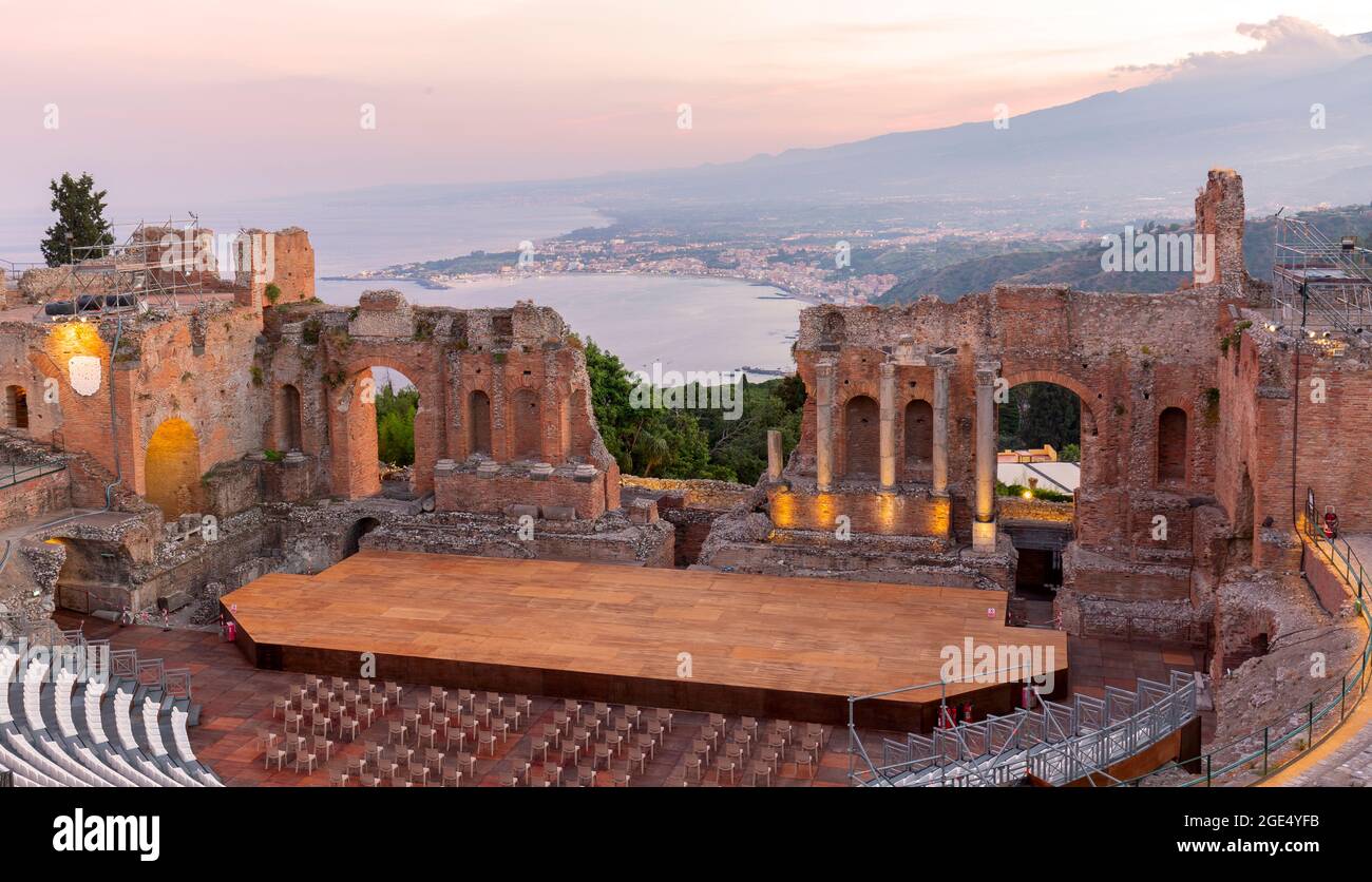 Sunset on the ancient roman-greek amphitheater with the Giardini Naxos ...