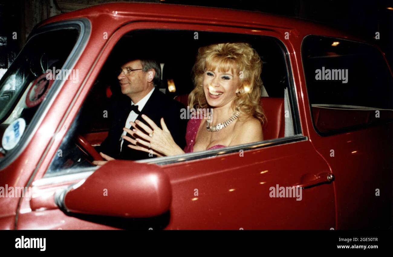London. UK. LIBRARY. Early 1990s; Sally Farmiloe and Jeffrey Archer at ...