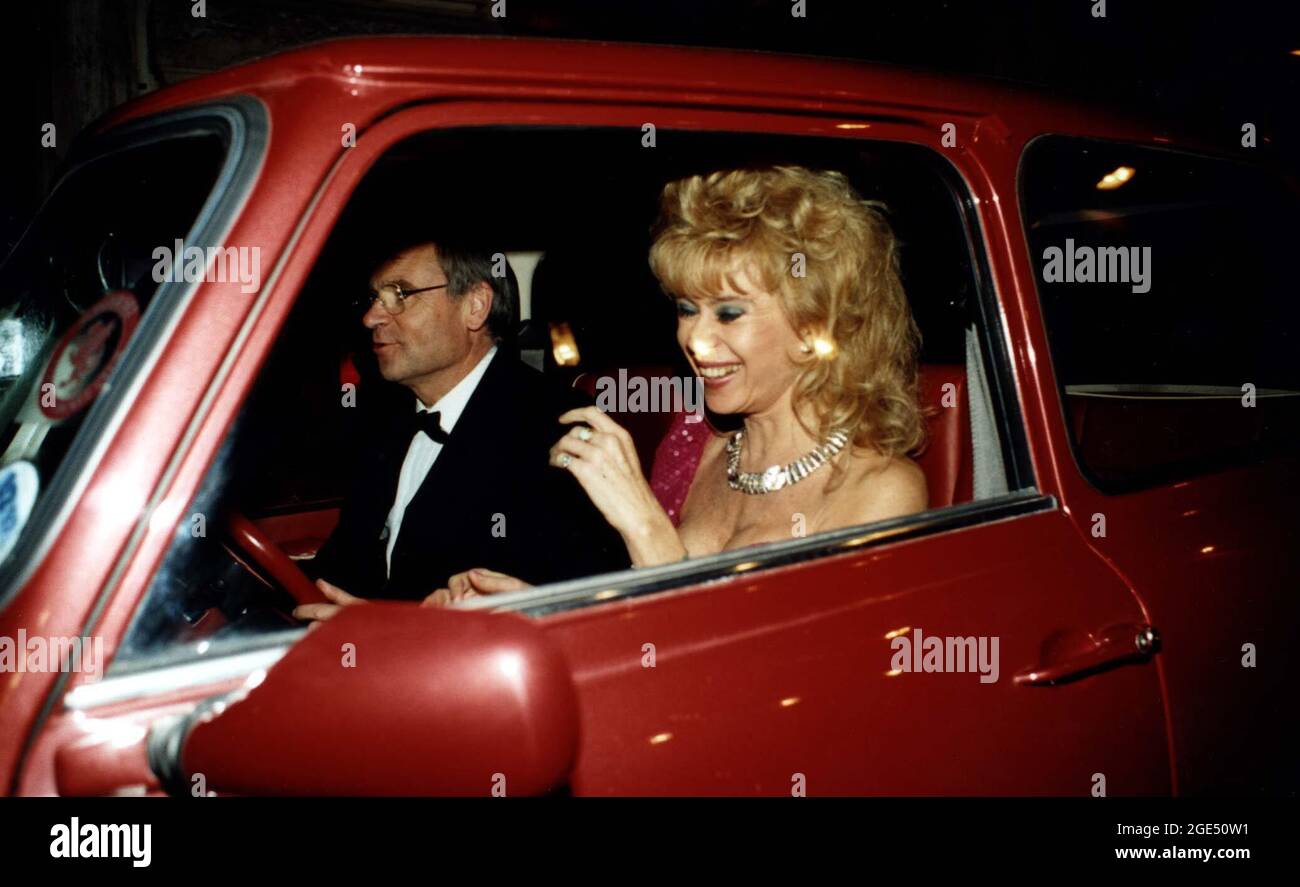 London. UK. LIBRARY. Early 1990s; Sally Farmiloe and Jeffrey Archer at ...