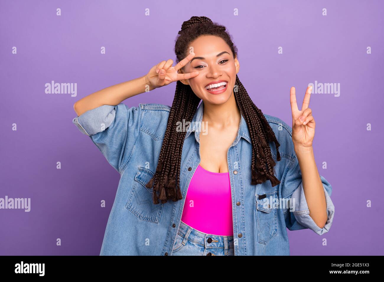 Portrait of attractive funky cheerful girl showing v-sign good mood ...