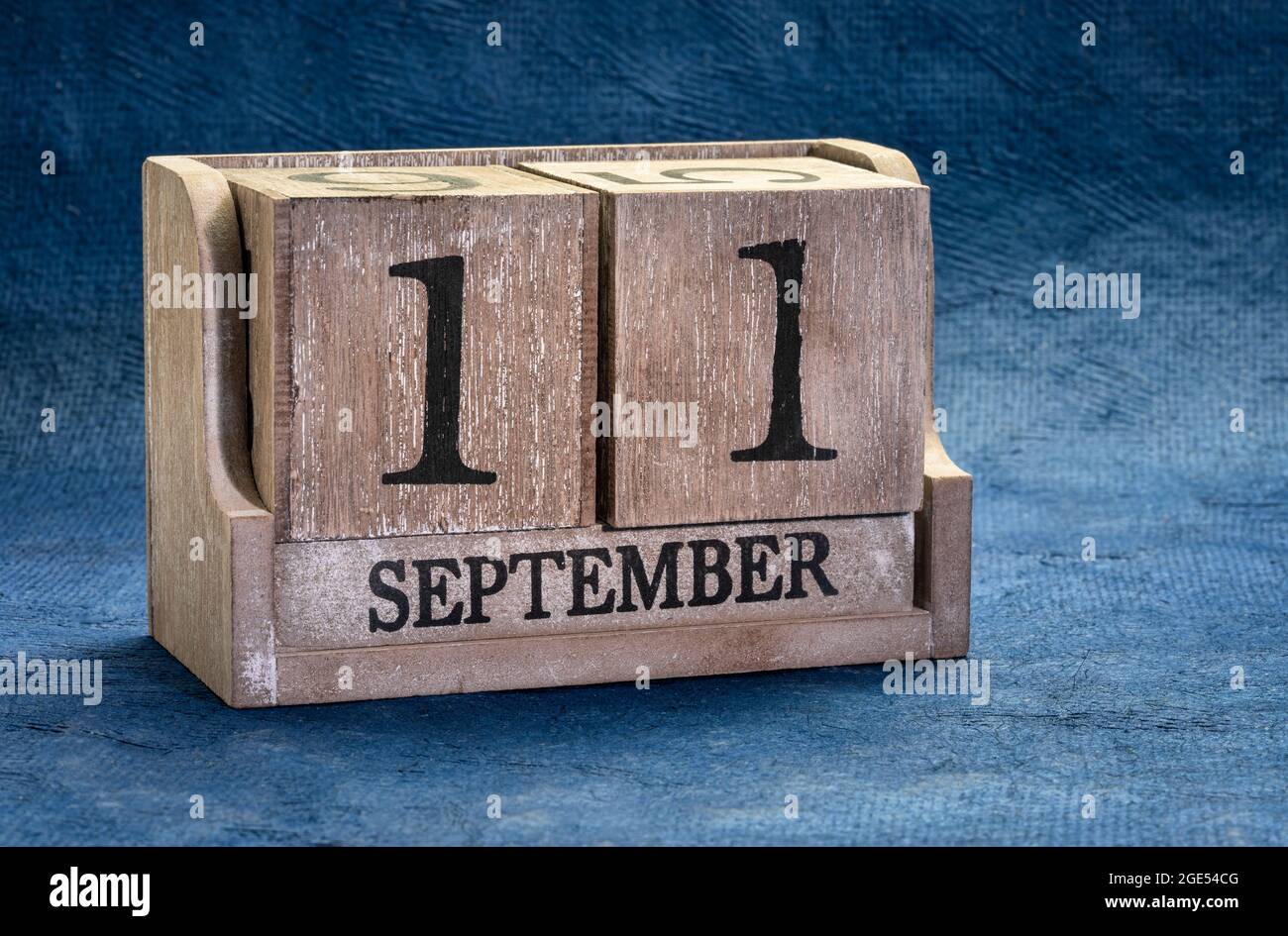 September 11 date in a rustic wood block calendar, reminder of ...