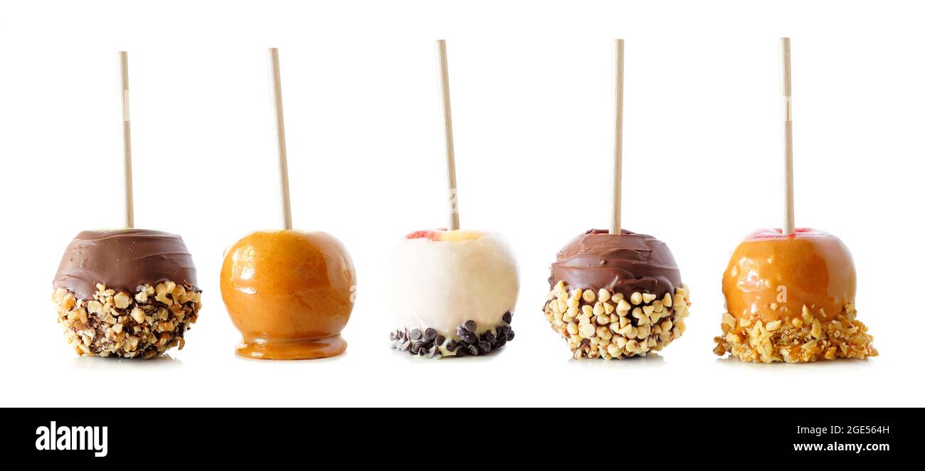 Variety of autumn candy apples with caramel, chocolate and nuts ...