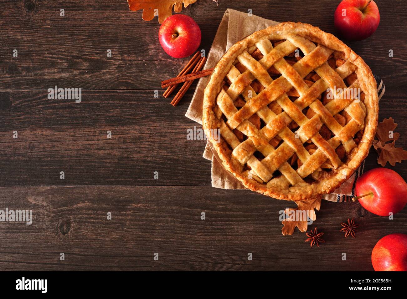 Homemade autumn apple pie corner border. Above view table scene over a ...