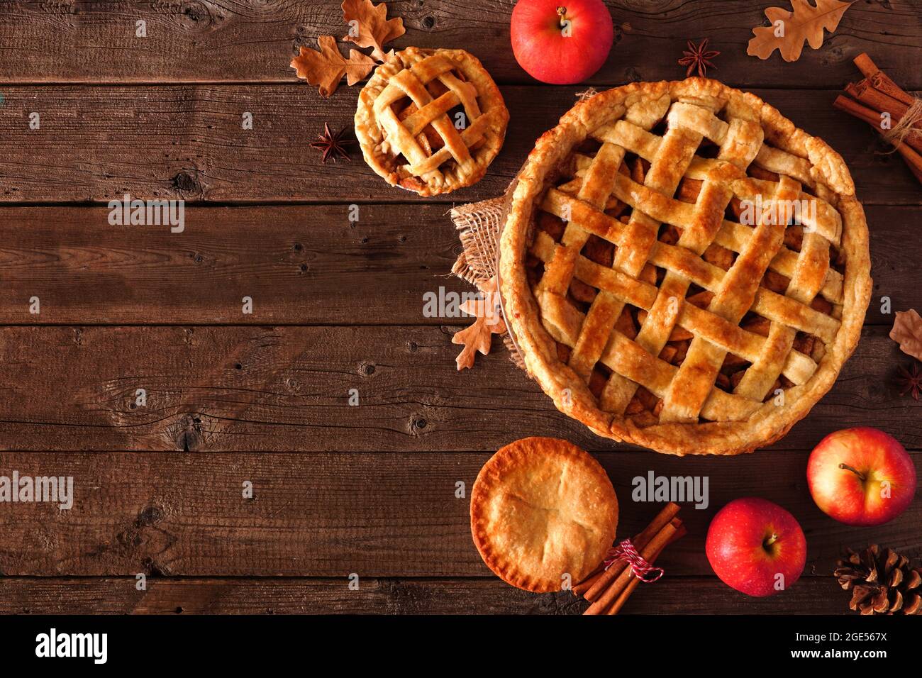 Homemade autumn apple pie corner border. Top view table scene over a ...