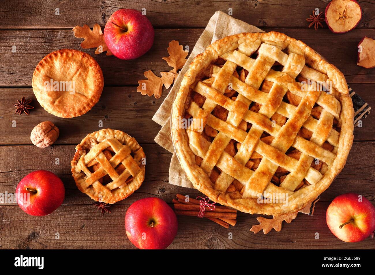 Homemade autumn apple pies, top view table scene with a rustic wood ...