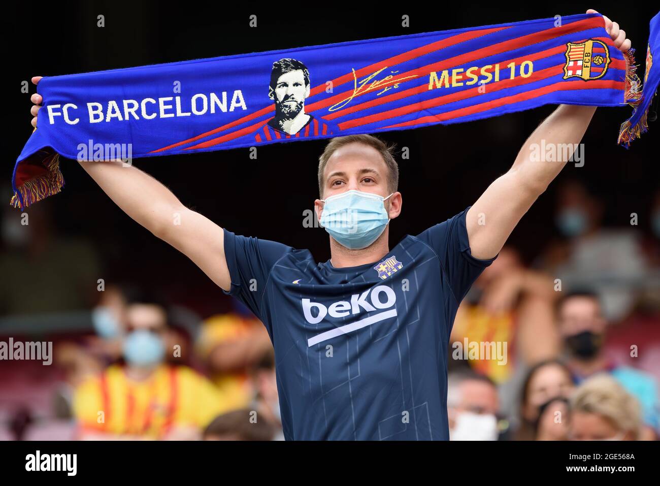 BARCELONA - AUG 15: A fan shows a Leo Messi scarf at the La Liga match ...