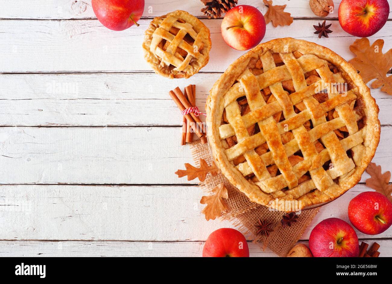 Homemade autumn apple pie corner border. Top view table scene over a ...