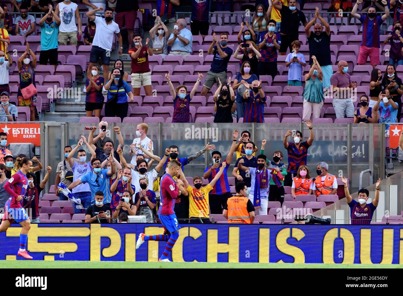 BARCELONA - AUG 15: Gerard Pique celebrates a goal with the fans at the ...