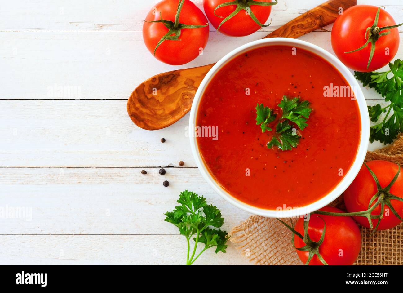 Homemade tomato soup. Above view, side border with copy space on a ...
