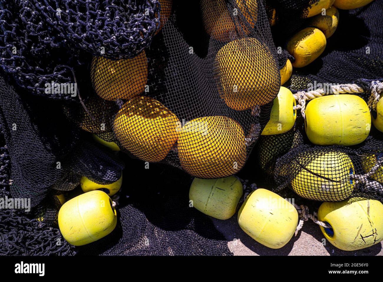 Black fishing net with yellow float for fishing boat or sardine called ...