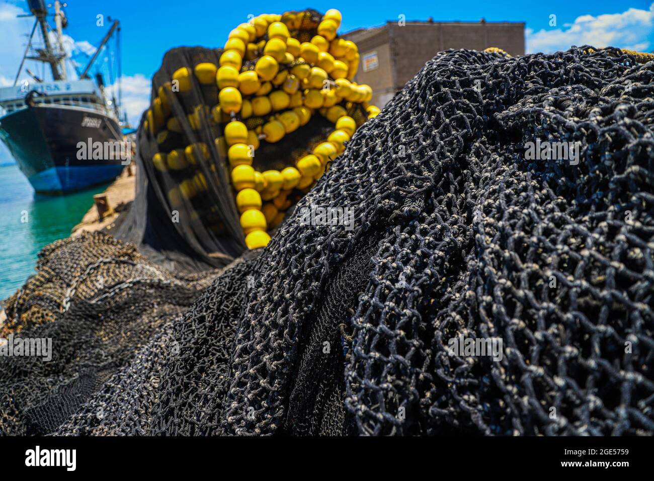 Black fishing net with yellow float for fishing boat or sardine called ...