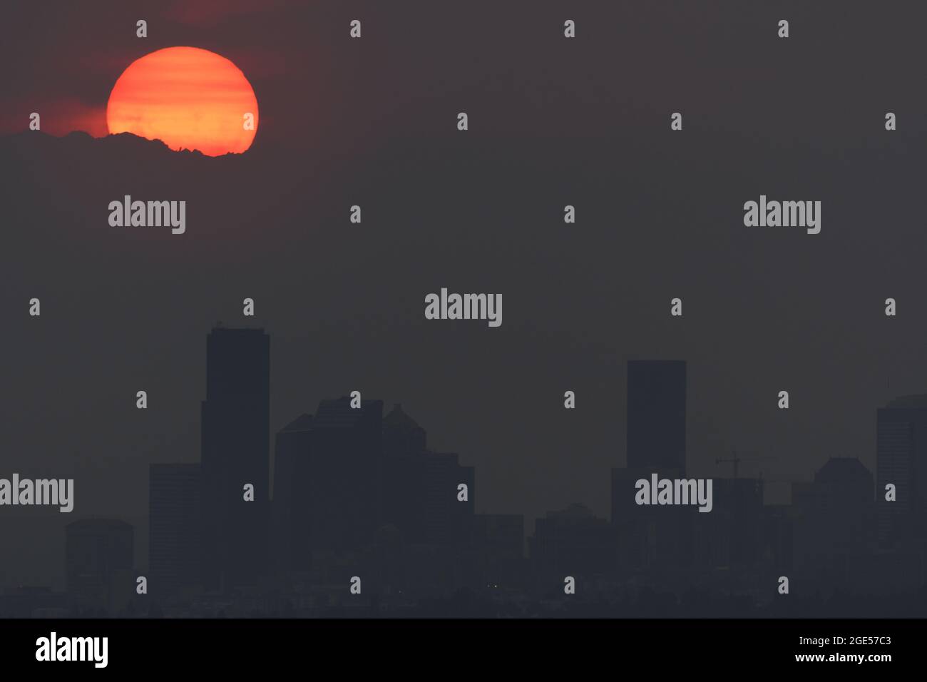 Heavy wildfire smoke surrounds Seattle with sunset behind the Olympic ...