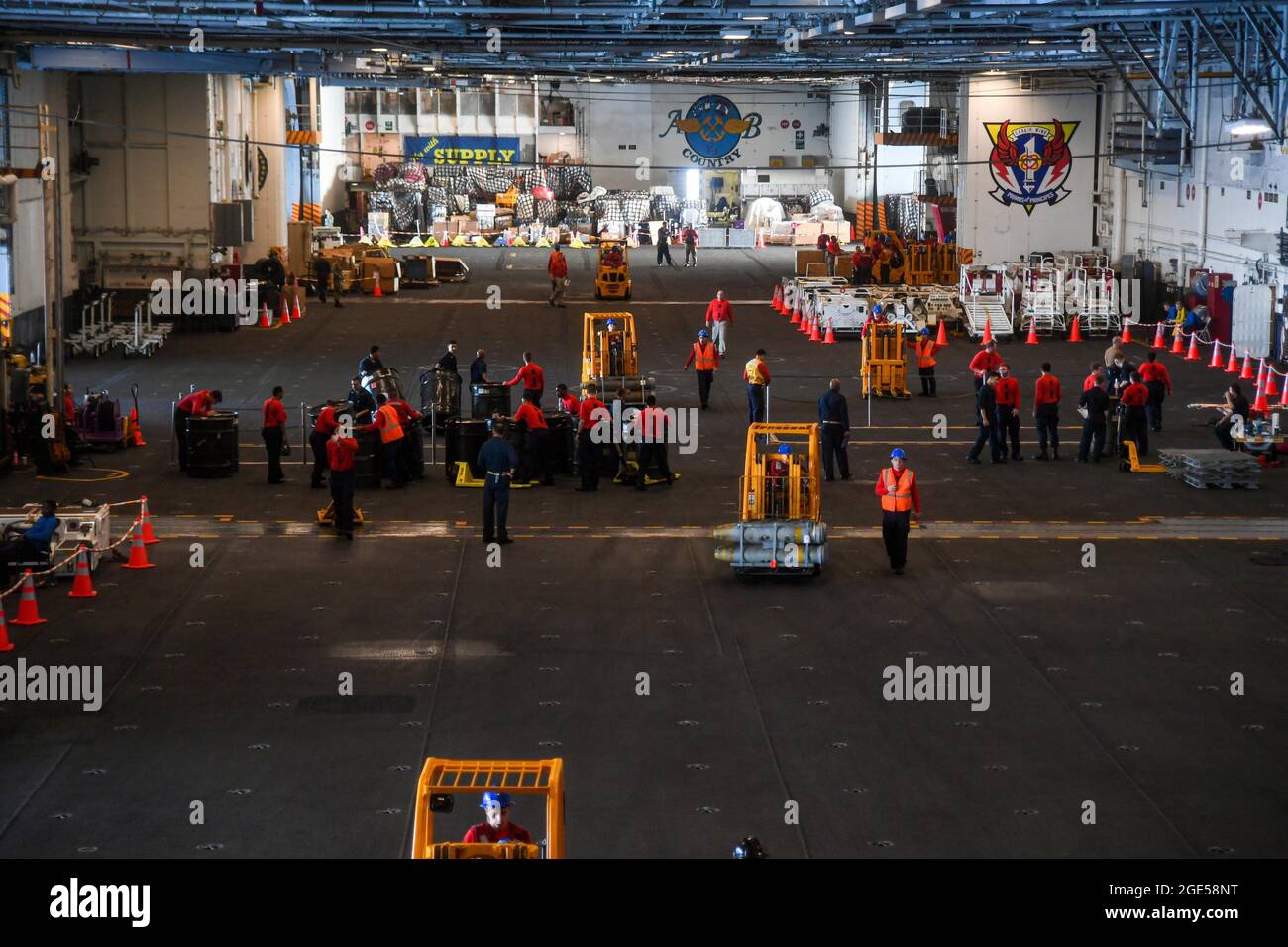 210813-N-MQ631-1038 ATLANTIC OCEAN (Aug. 13, 2021) Sailors transport ...