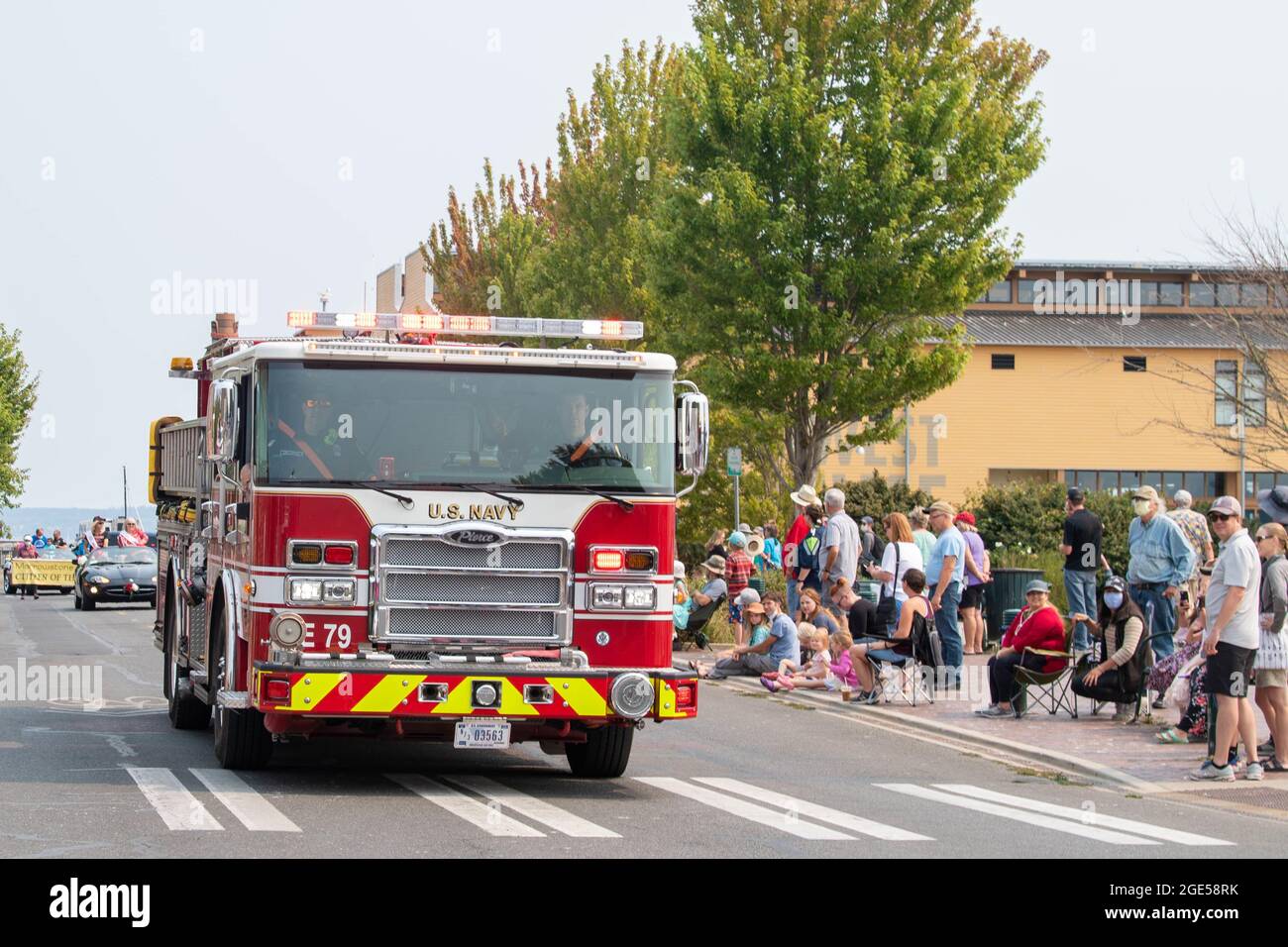 Locals observe a Naval Magazine Indian Island fire truck in the 2021 ...