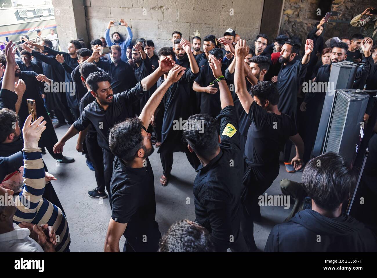 Kashmiri Shia Muslims seen dancing during a Muharram procession in ...