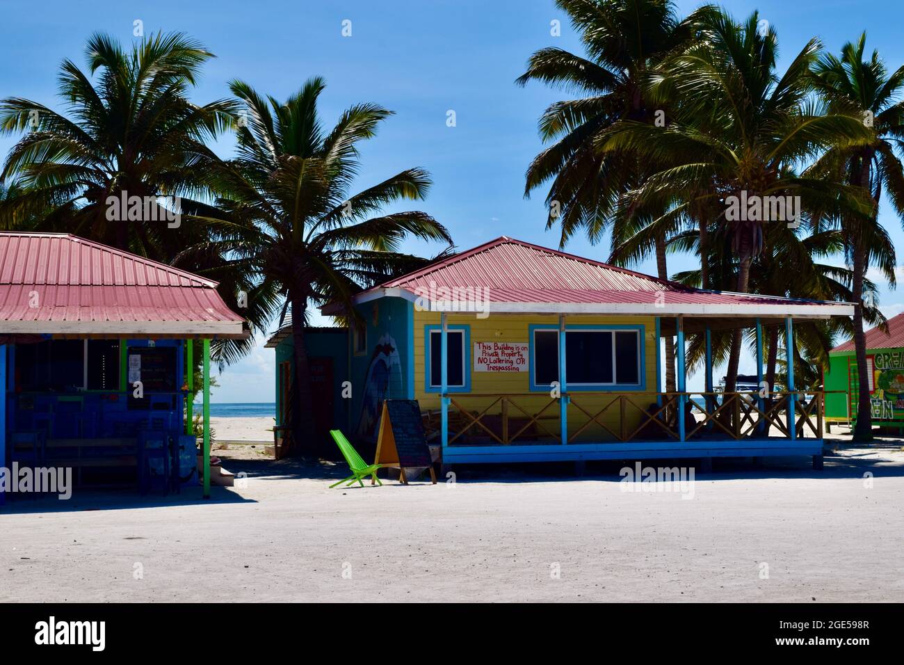 Colorful buildings at the split on Caye Caulker, Belize Stock Photo - Alamy