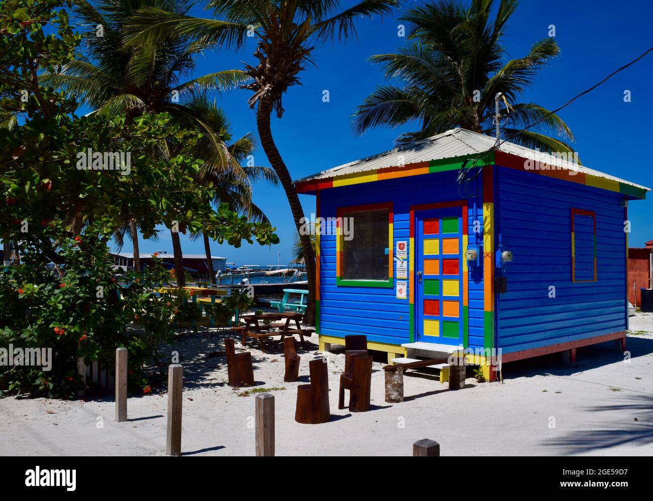 A colorful wood building on the beach in Caye Caulker, Belize Stock ...