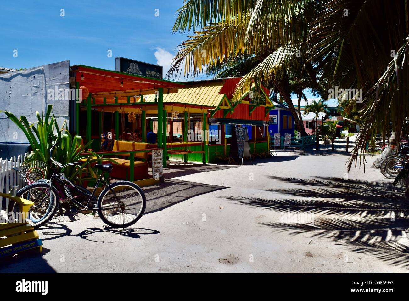 Bright, colorful buildings on the beach in Caye Caulker, Belize Stock ...