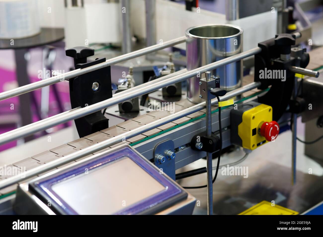 Automated production line with plastic modular conveyor belt. An empty ...