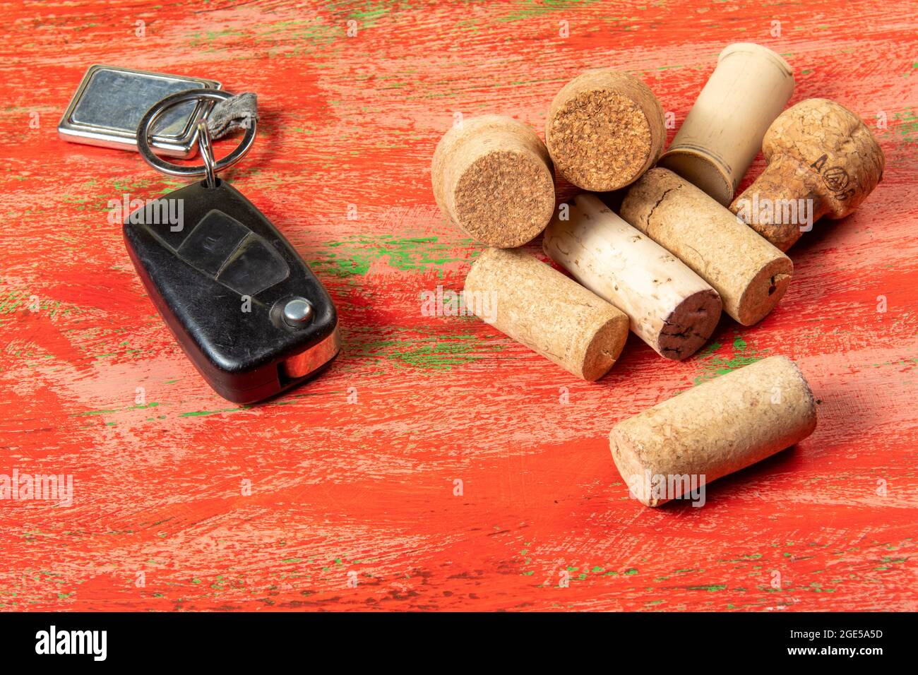 alcohol abuse and danger in car driving symbolized by key and cork ...