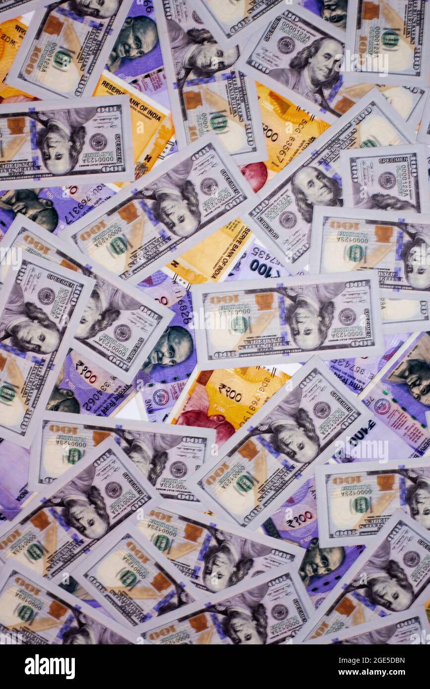 American one hundred dollar bill and Indian paper currency banknote as ...