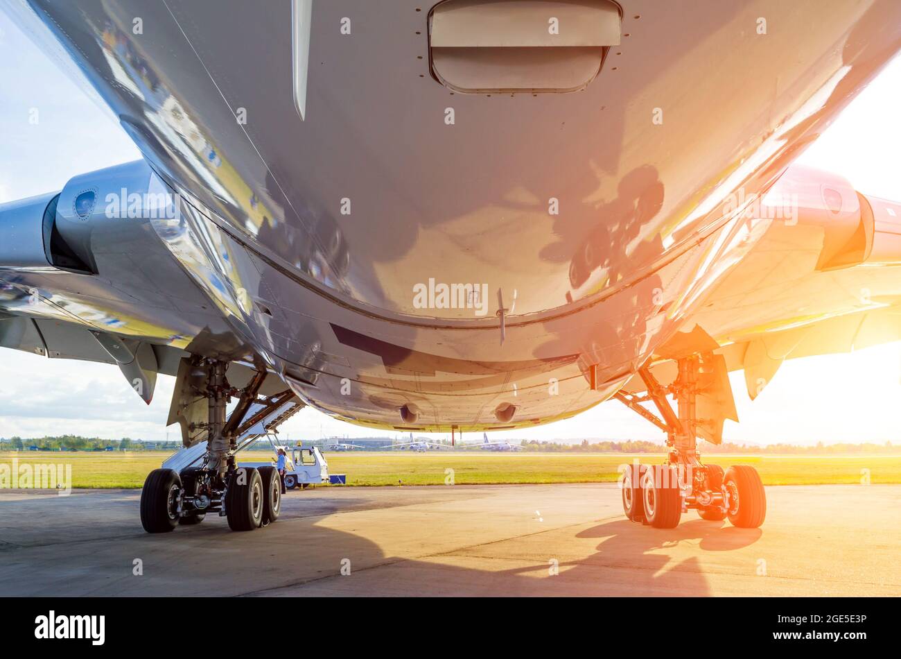 Large modern airplane view from bottom to bottom and landing gear ...