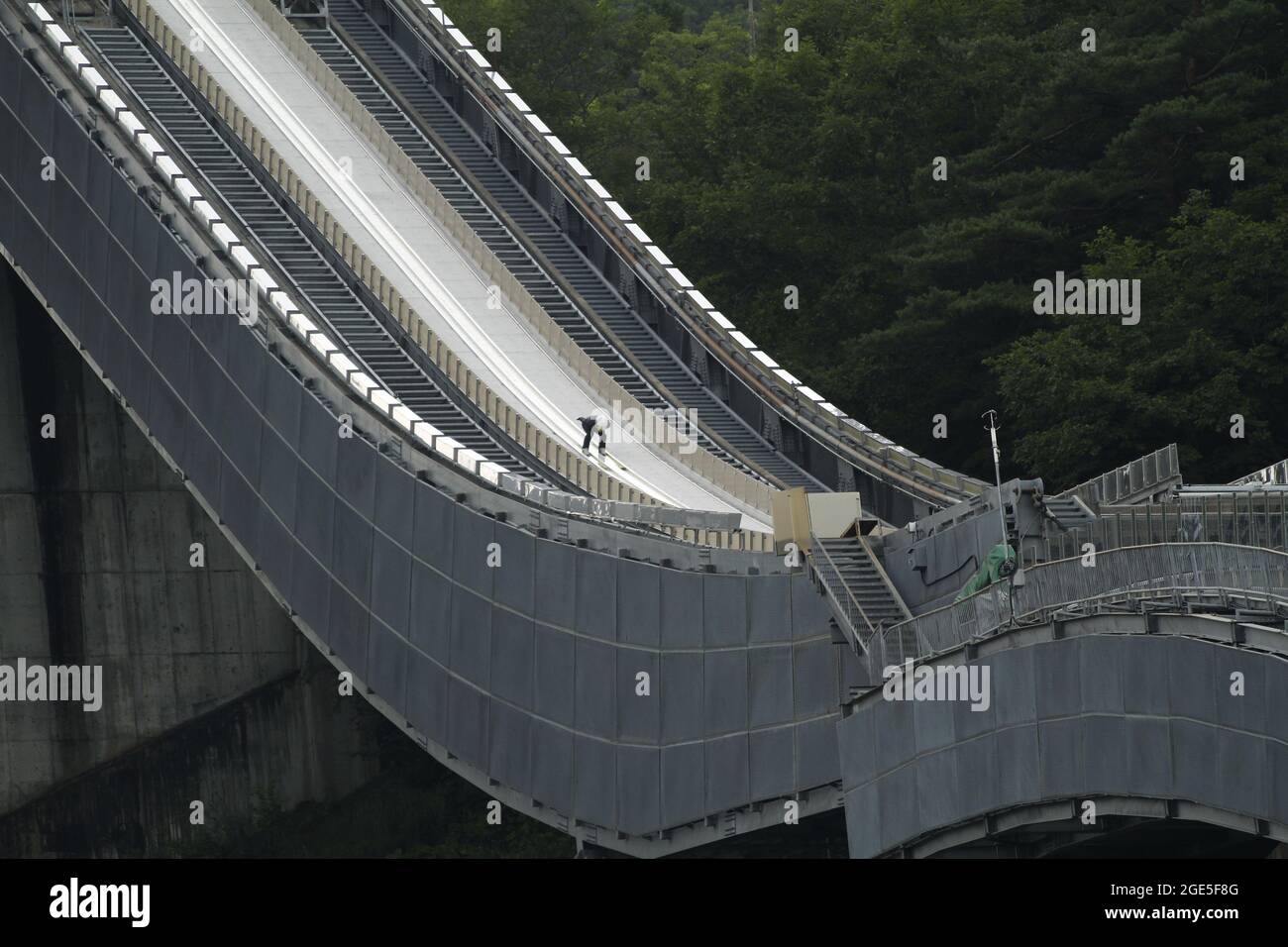 Nagano, Japan, 2021-10-08 , Athlete practicing for the jump at the ...