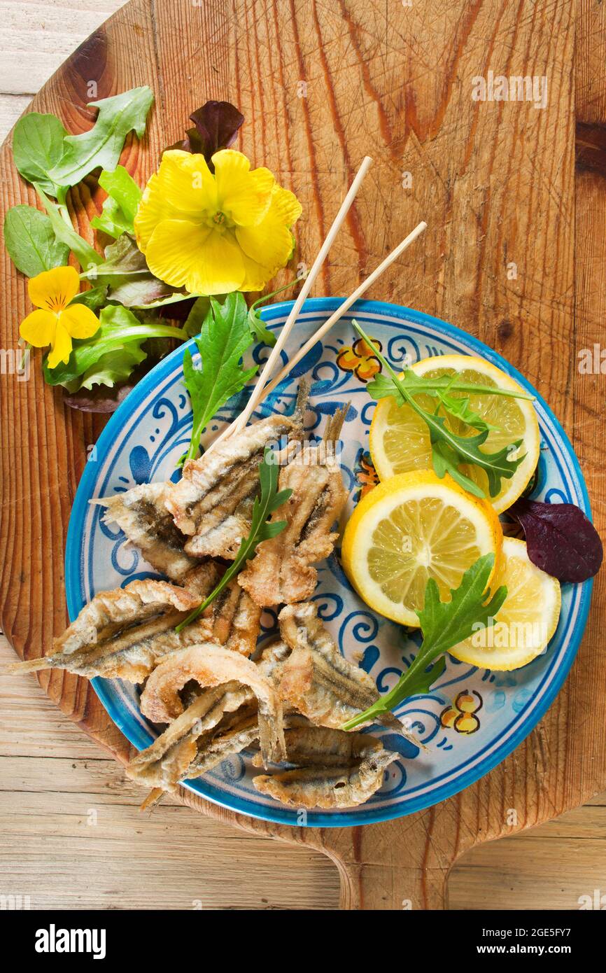 Presentation of a second dish based on frying blue fish Stock Photo - Alamy