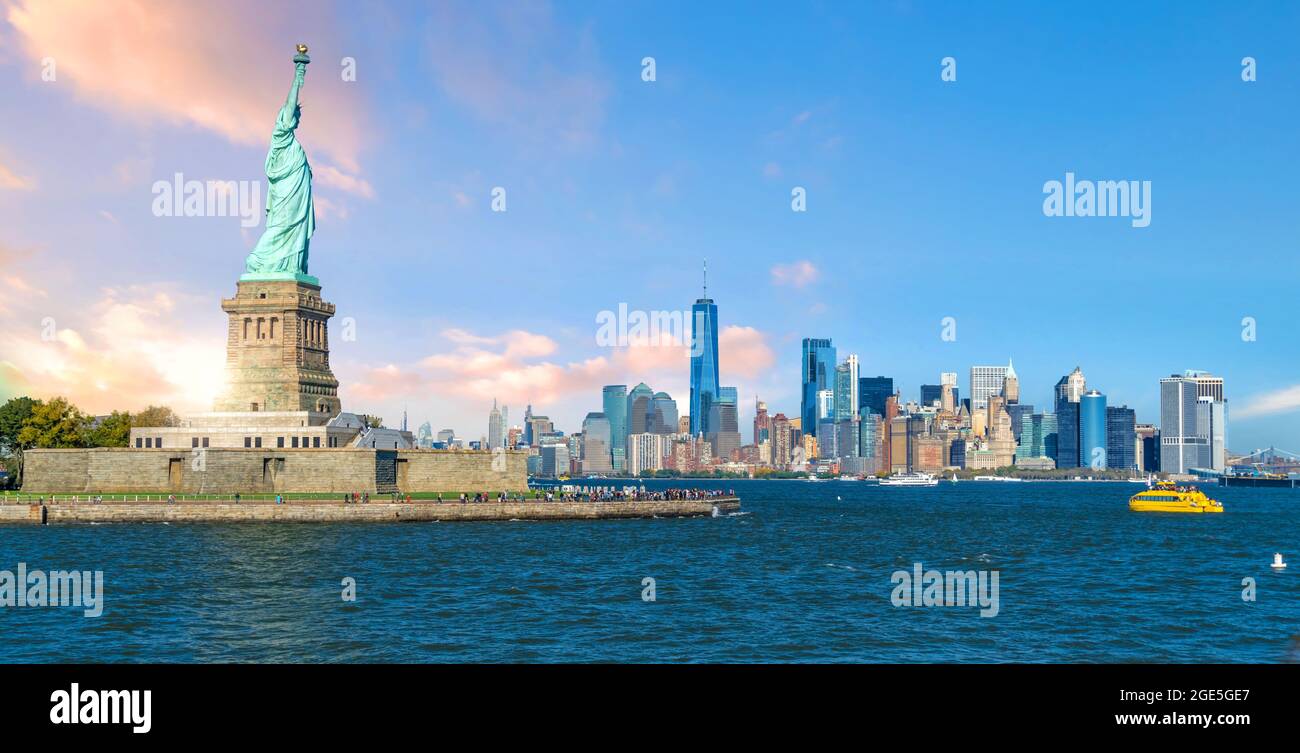 The Statue of Liberty with Manhattan city skyline background, Landmarks ...