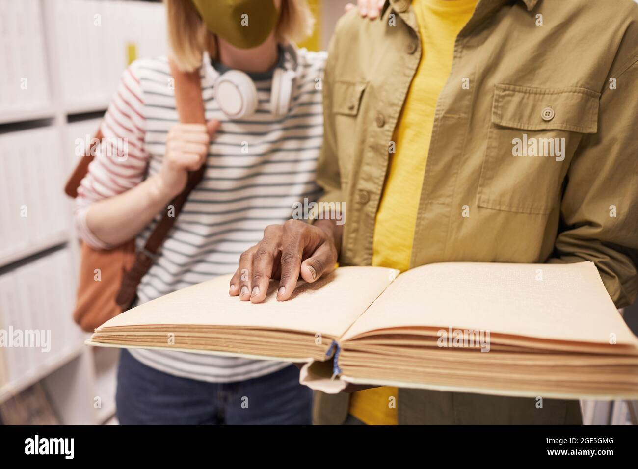 Blind studying hi-res stock photography and images - Alamy