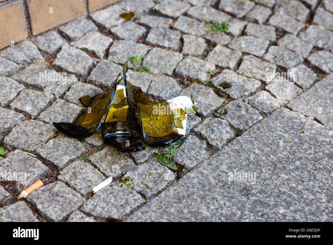 Berlin, Germany. 15th Aug, 2021. A broken beer bottle lies on the floor ...