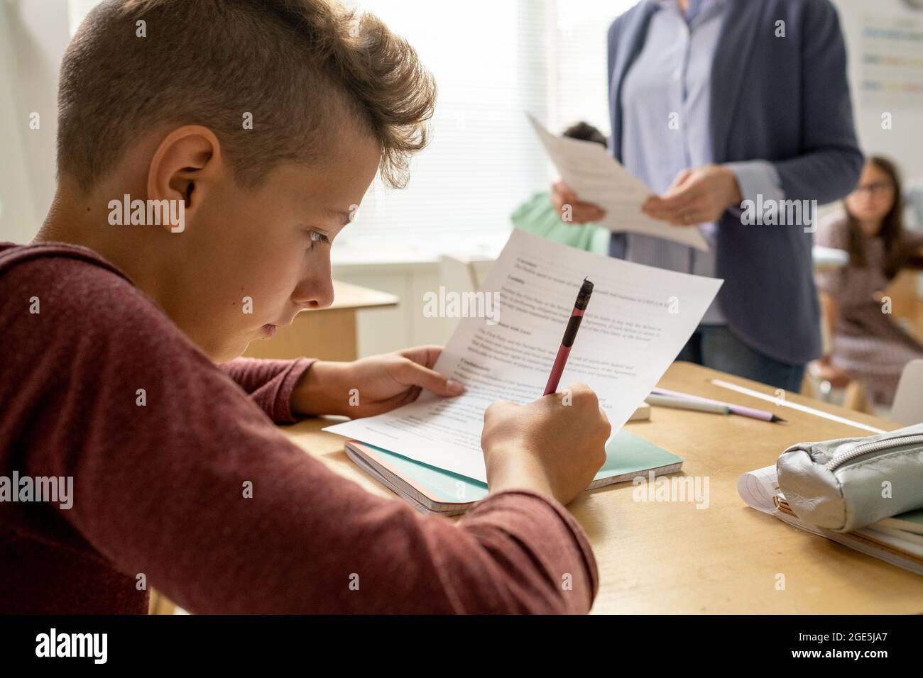 Woman teacher carrying child hi-res stock photography and images - Alamy
