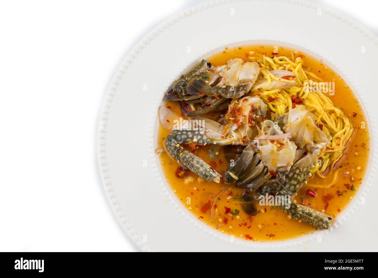 Famous Thai food, "Yum poo ma" spicy mango salad with blue crab isolate ...