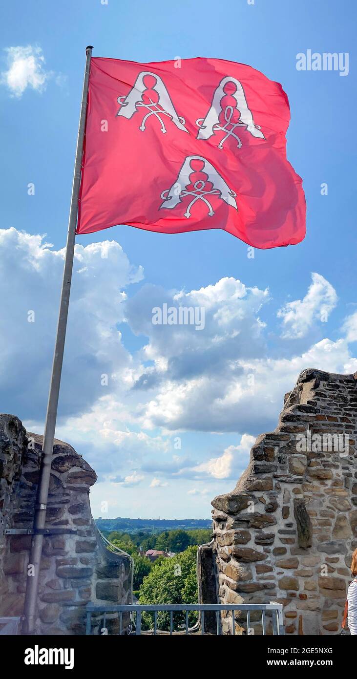 Flag with castle coat of arms of partially reconstructed former moated ...