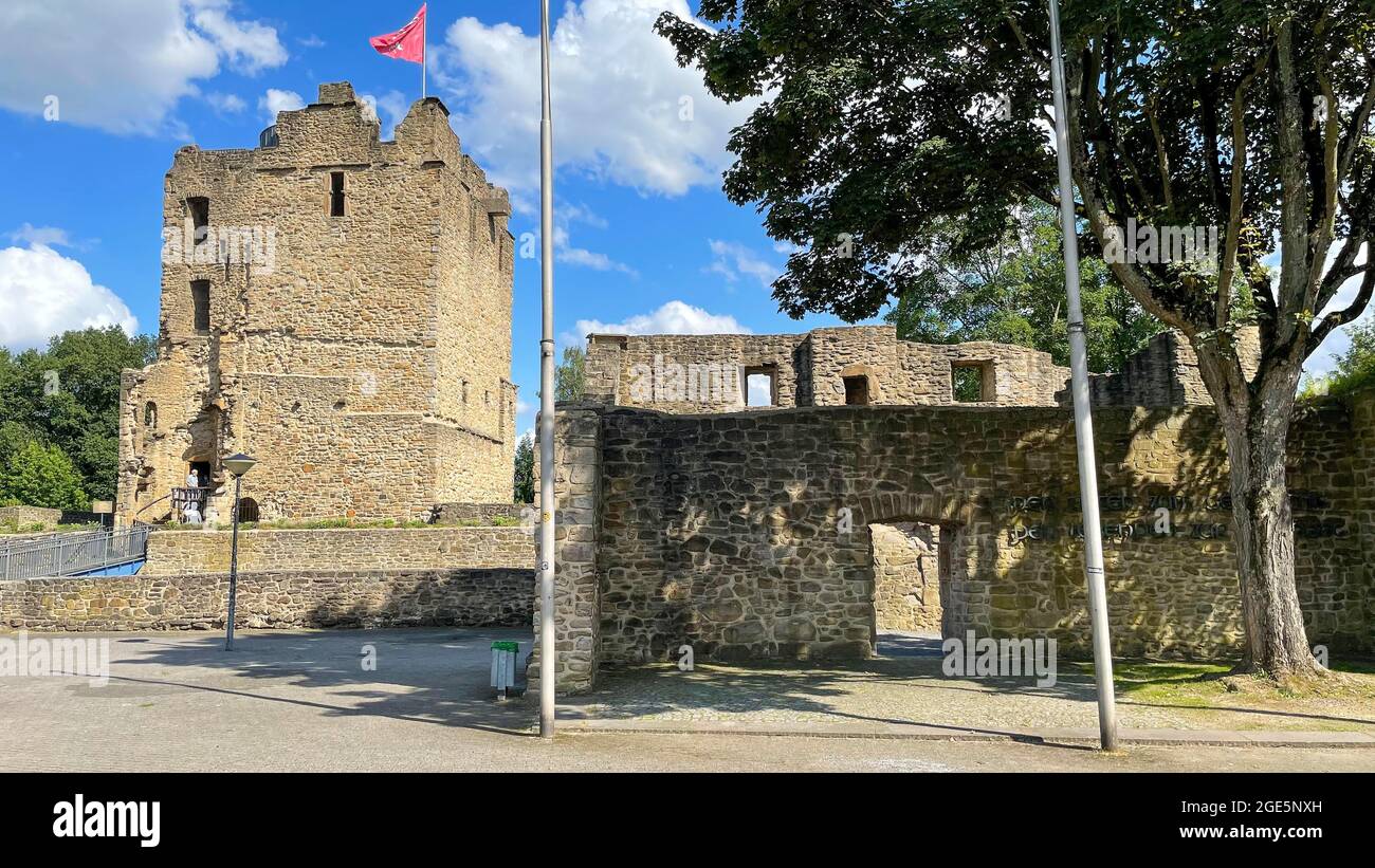 On the right, the ruins of the outer bailey of the partially ...