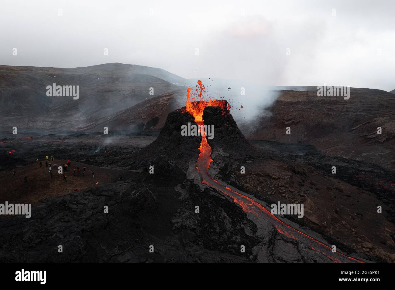 Aerial view, erupting volcano, crater with erupting lava and lava flow ...