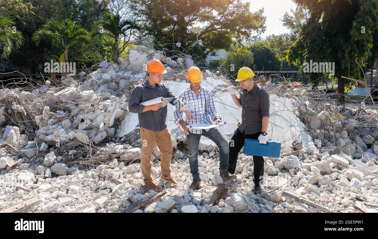Demolition control supervisor and contractor discussing on demolish ...