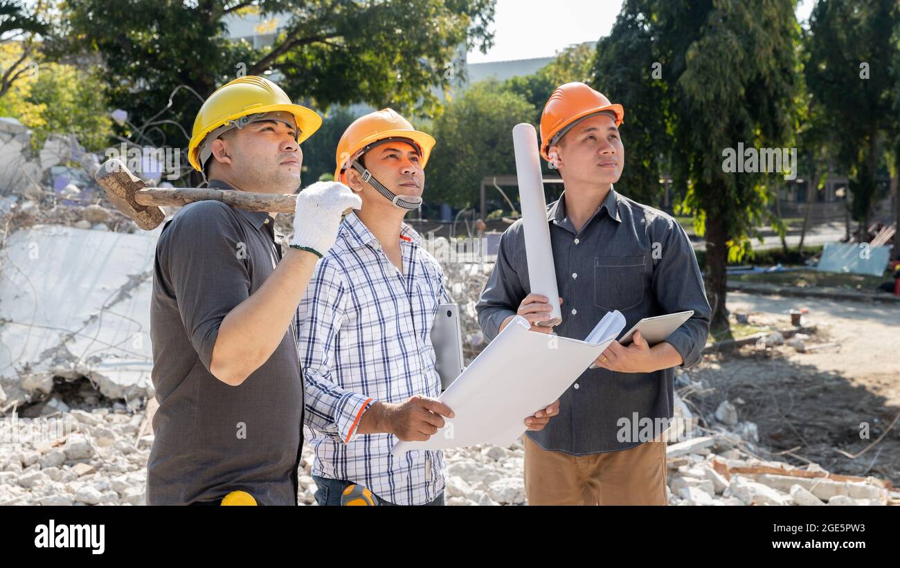 Demolition control supervisor and contractor discussing on demolish ...
