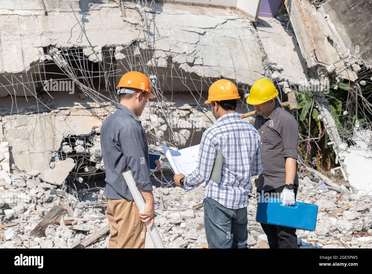 Demolition control supervisor and contractor discussing on demolish ...