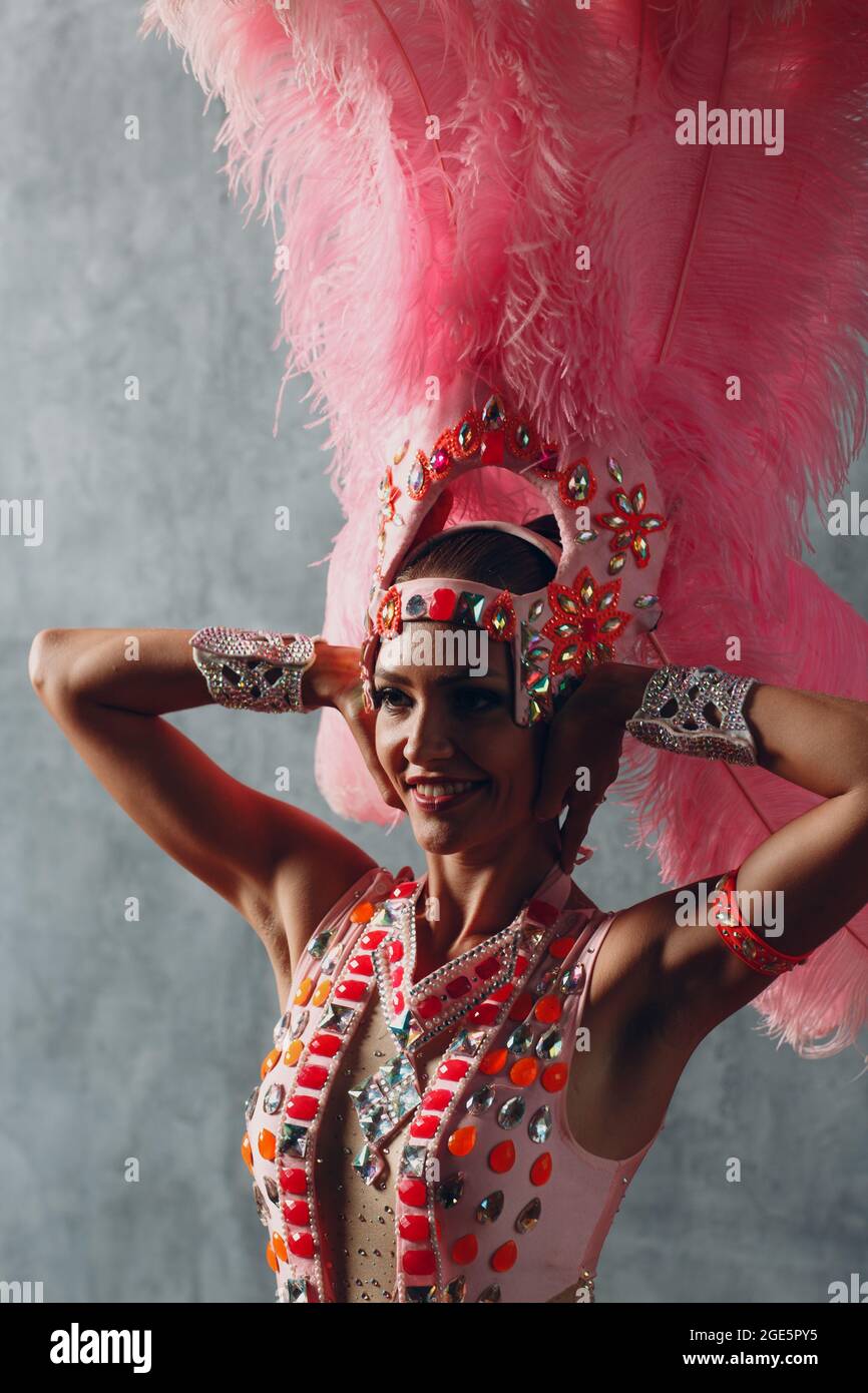Woman in samba or lambada costume with pink feathers plumage Stock ...