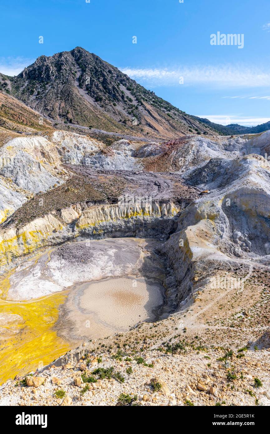Crater with yellow discoloured sulphur stones and colourful mineral ...
