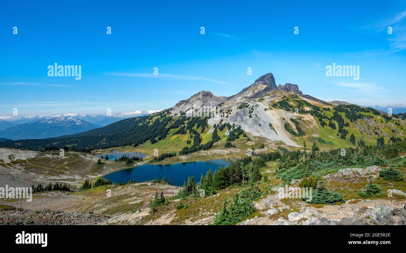 Blue lakes in front of Black Tusk volcanic mountain, Panorama Ridge ...