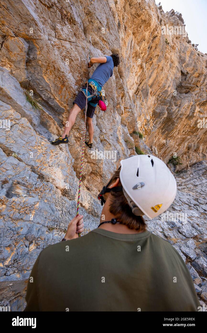 Climbing a rock face, belaying, lead climbing, sport climbing, Kalymnos ...