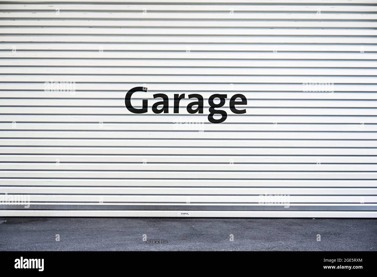 Garage door with inscription Garage Stock Photo - Alamy