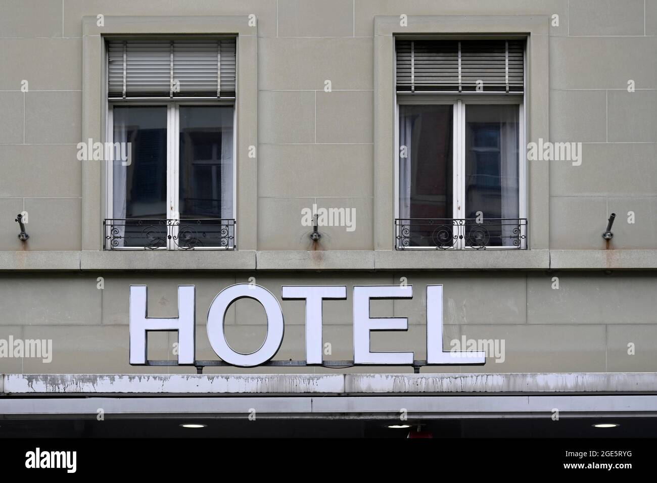Facade with hotel lettering Stock Photo - Alamy
