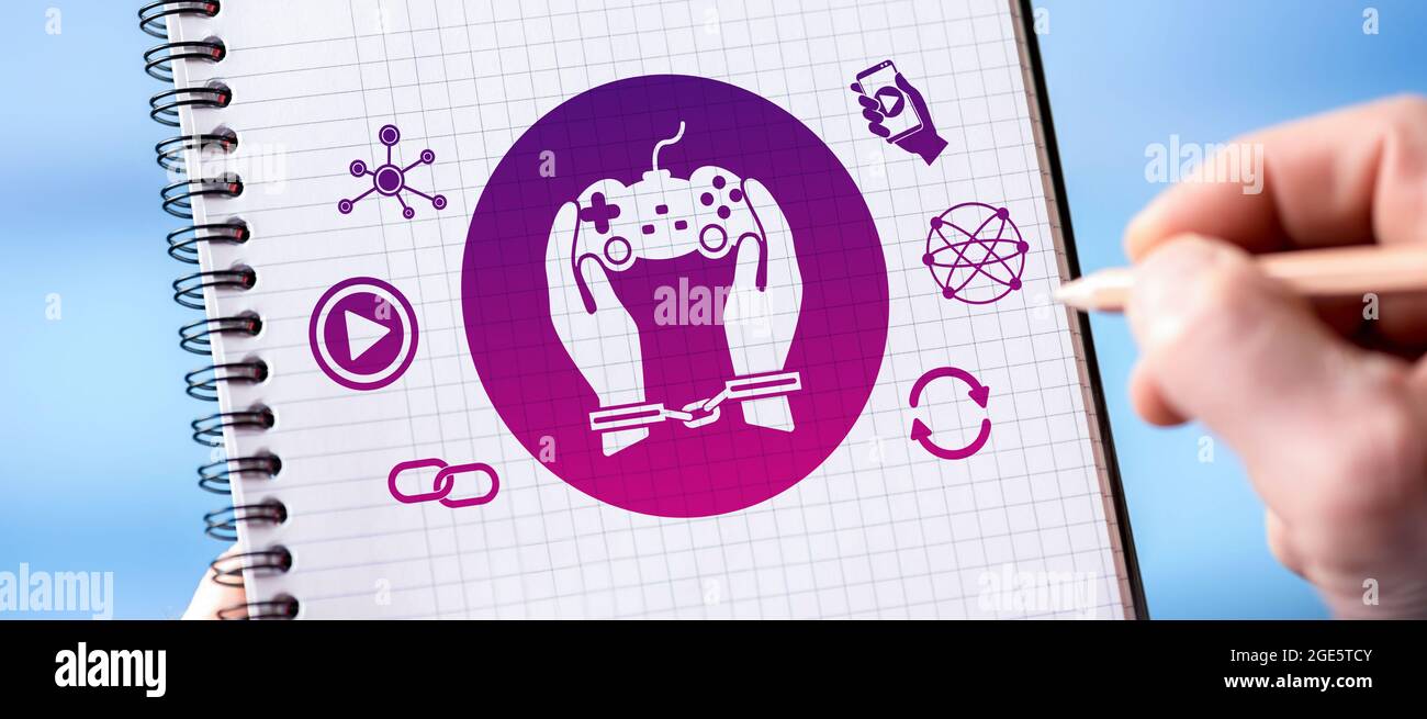 Hand drawing video game addiction concept on a notepad Stock Photo - Alamy