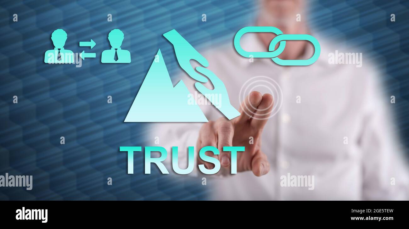 Man touching a trust concept on a touch screen with his finger Stock ...