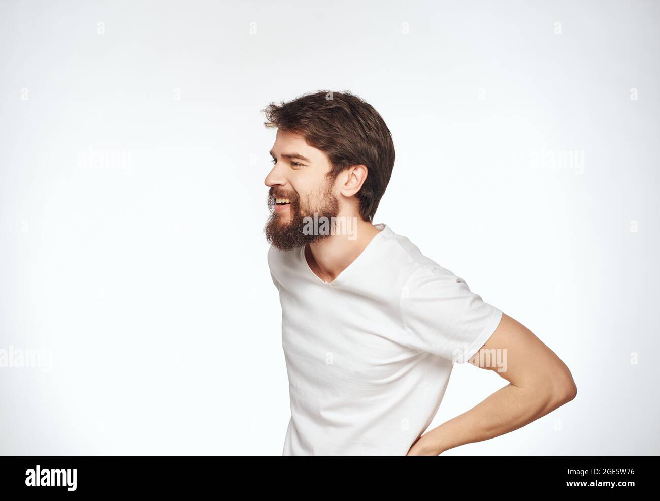 emotional man in a white t-shirt hand gestures anger Lifestyle Stock ...