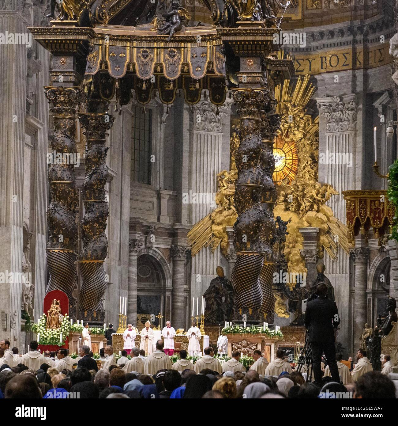 Pope with mitre prays during Saint Mass in St. Peter's Basilica in ...